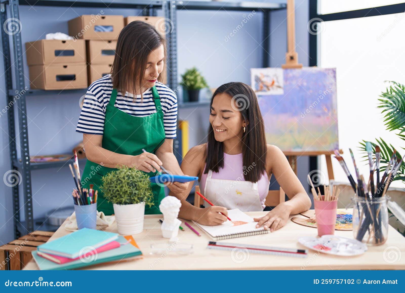 Two Women Artists Using Touchpad Drawing on Notebook at Art Studio ...