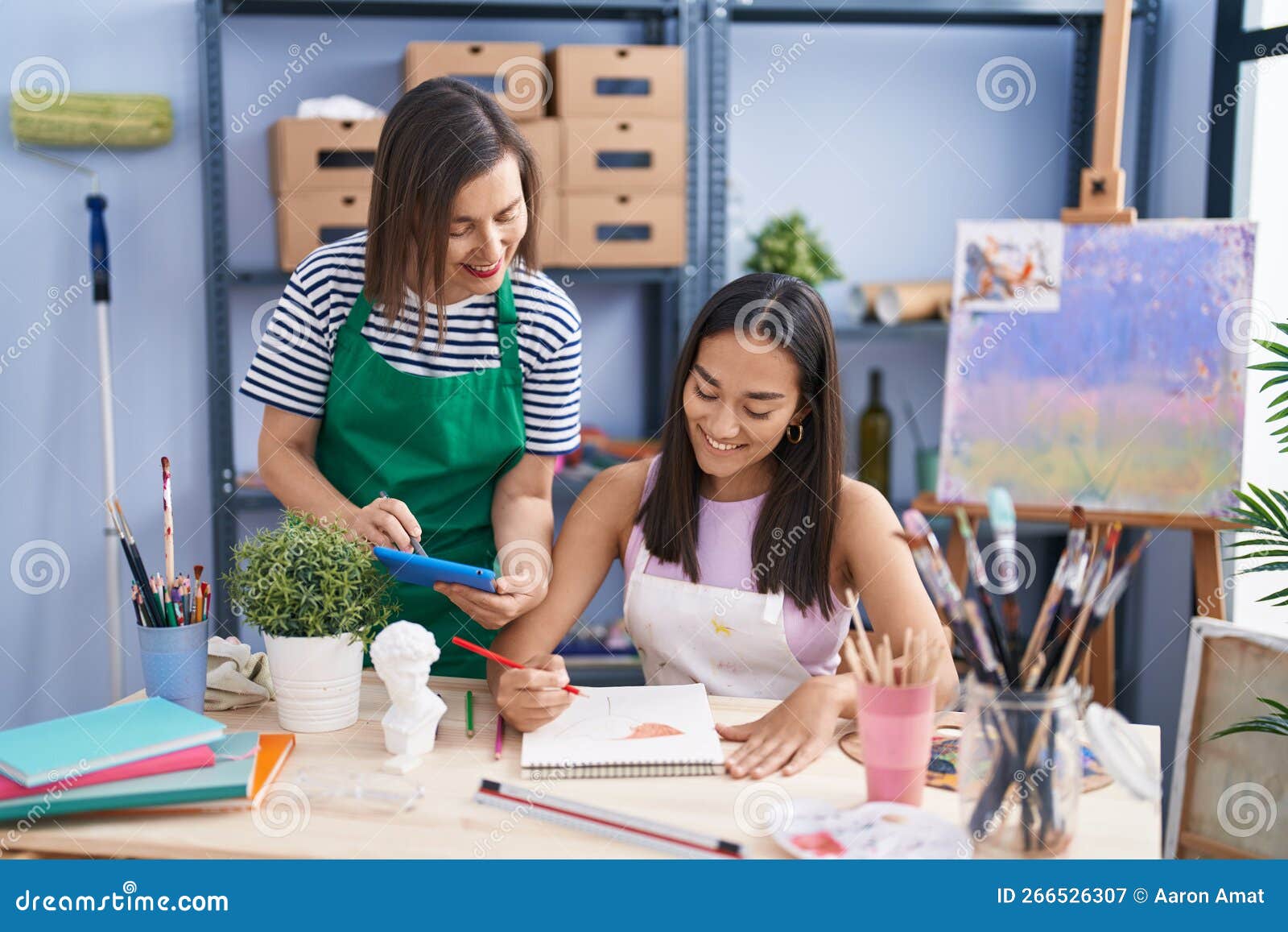 Two Women Artists Using Touchpad Drawing on Notebook at Art Studio ...