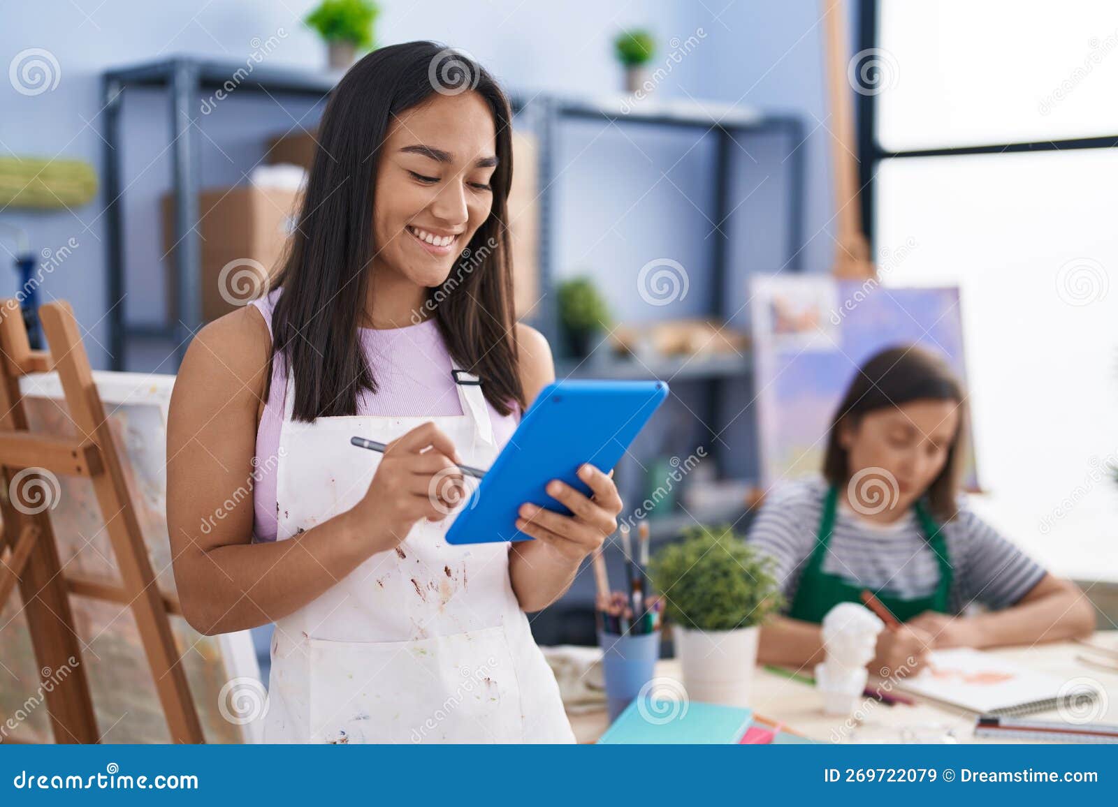 Two Women Artists Using Touchpad Drawing on Notebook at Art Studio ...