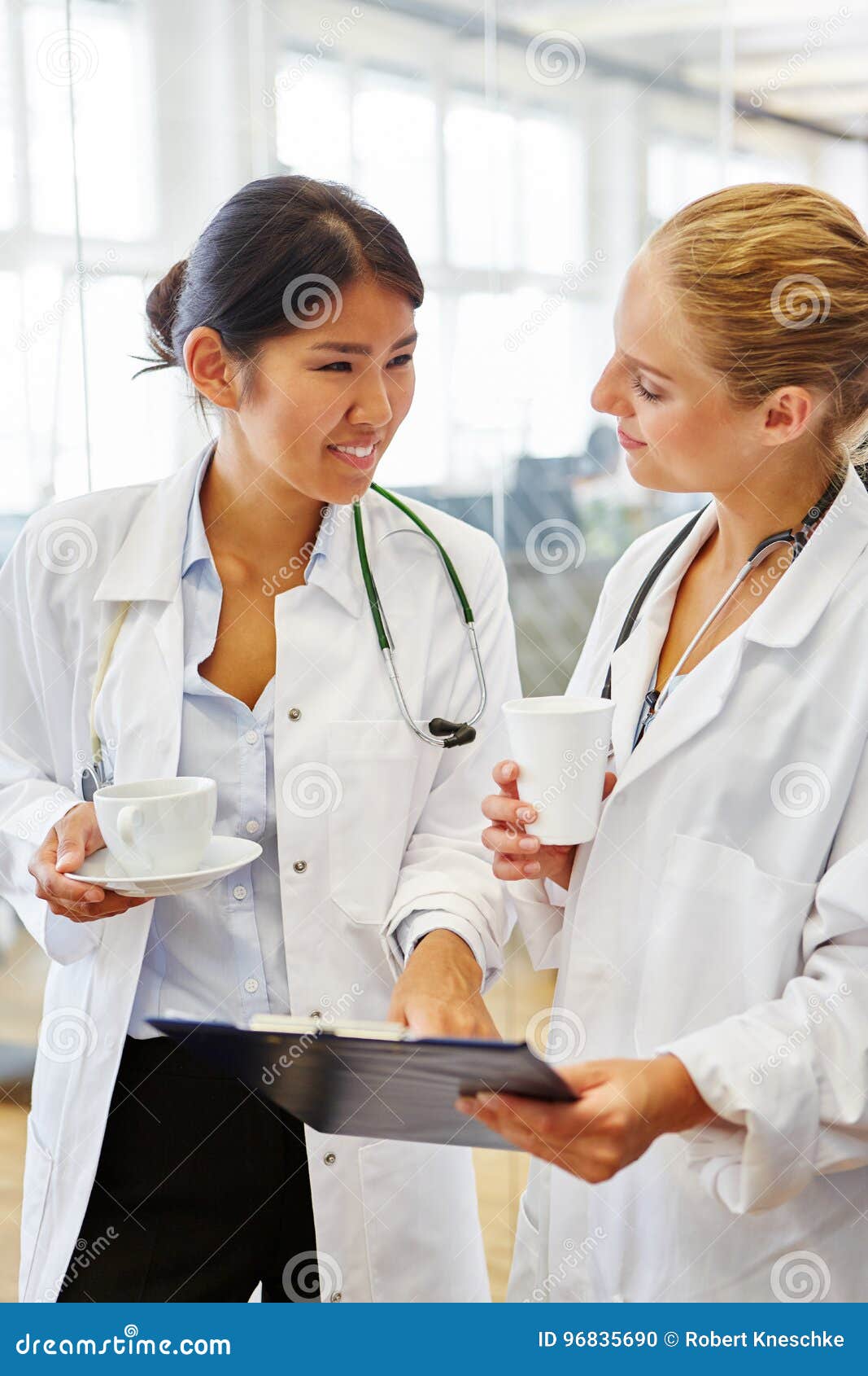 Two Women As Doctors Working Together Stock Photo - Image of workshop ...