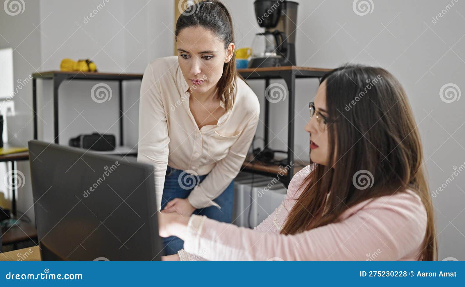 Two Women Business Workers Using Computer Speaking at Office Stock ...