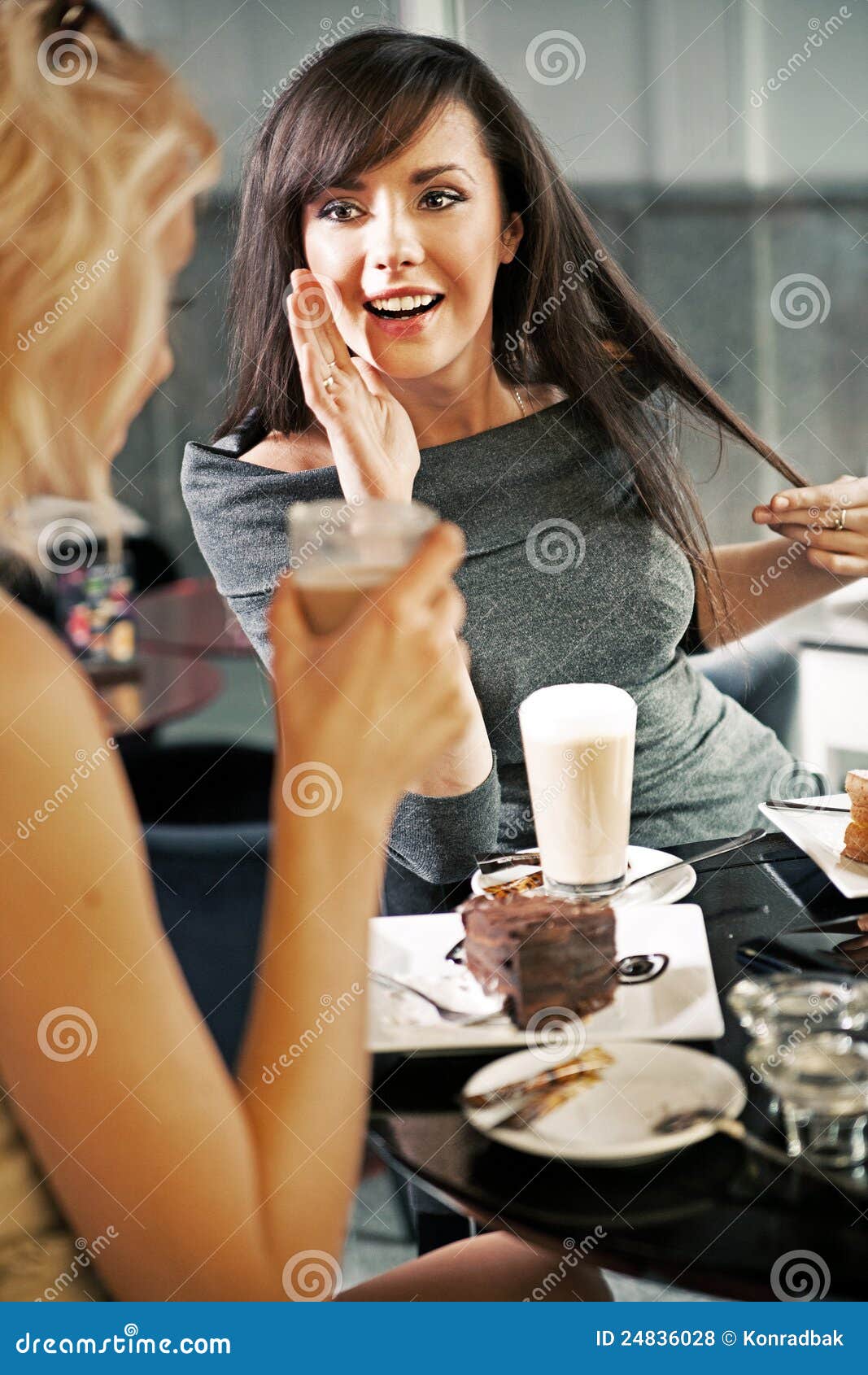 Two women chatting stock photo. Image of horizontal, eating - 24836028