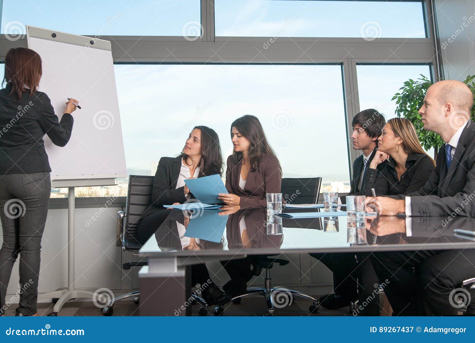 Two Women Comparing Data during a Workshop Stock Image - Image of ...