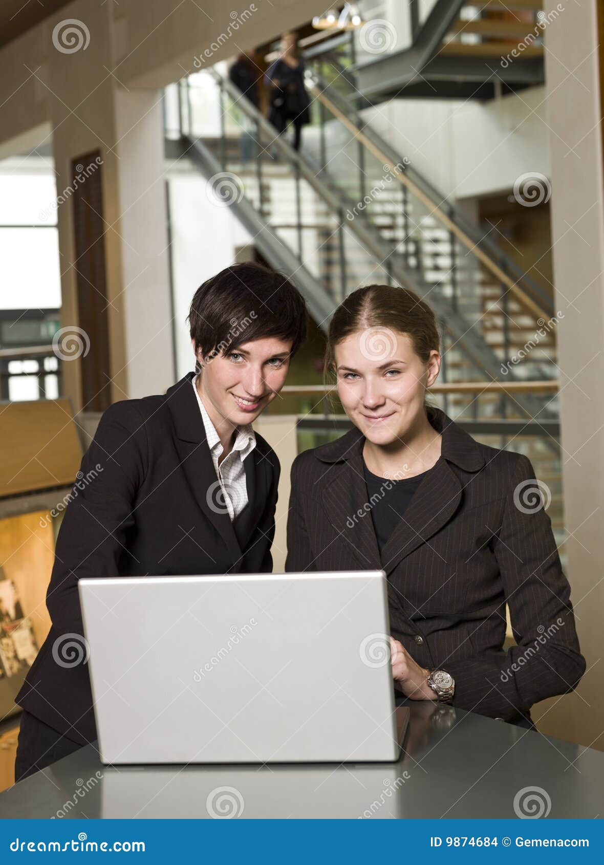 Two women and a computer stock photo. Image of computer - 9874684