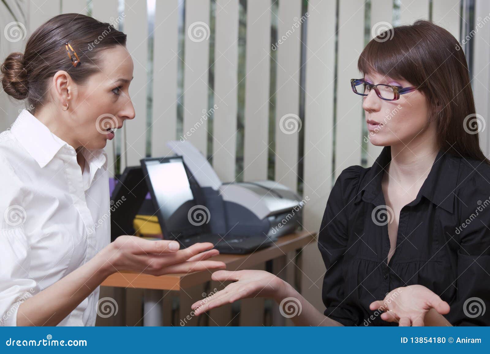 Two Women Discussing in Office Stock Photo - Image of adults, stress ...