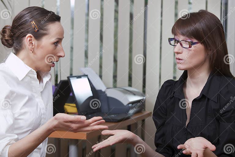 Two Women Discussing in Office Stock Photo - Image of adults, stress ...