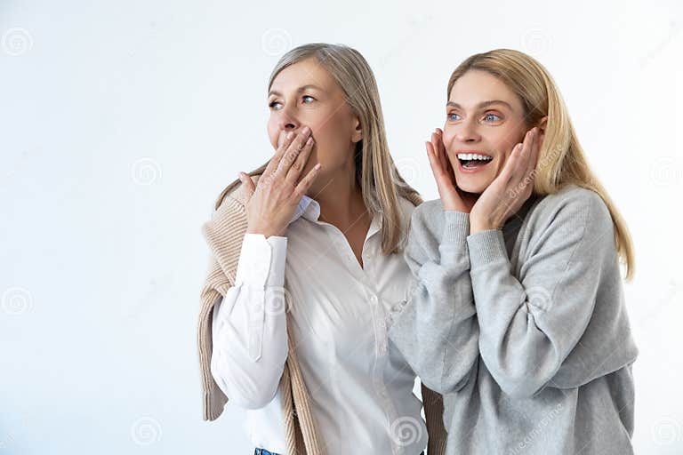 Two Women Discussing Something and Looking Impressed Stock Image ...