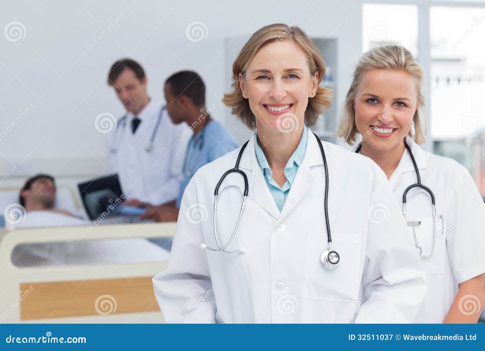 Two Women Doctors Standing and Looking at the Camera Stock Image ...