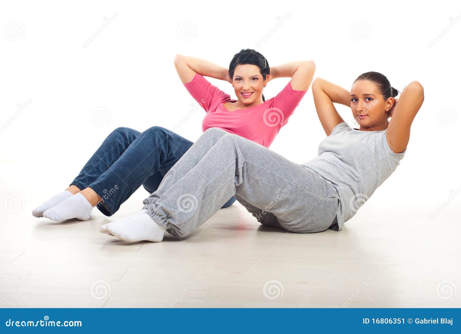 Two women doing abs stock image. Image of activity, background - 16806351