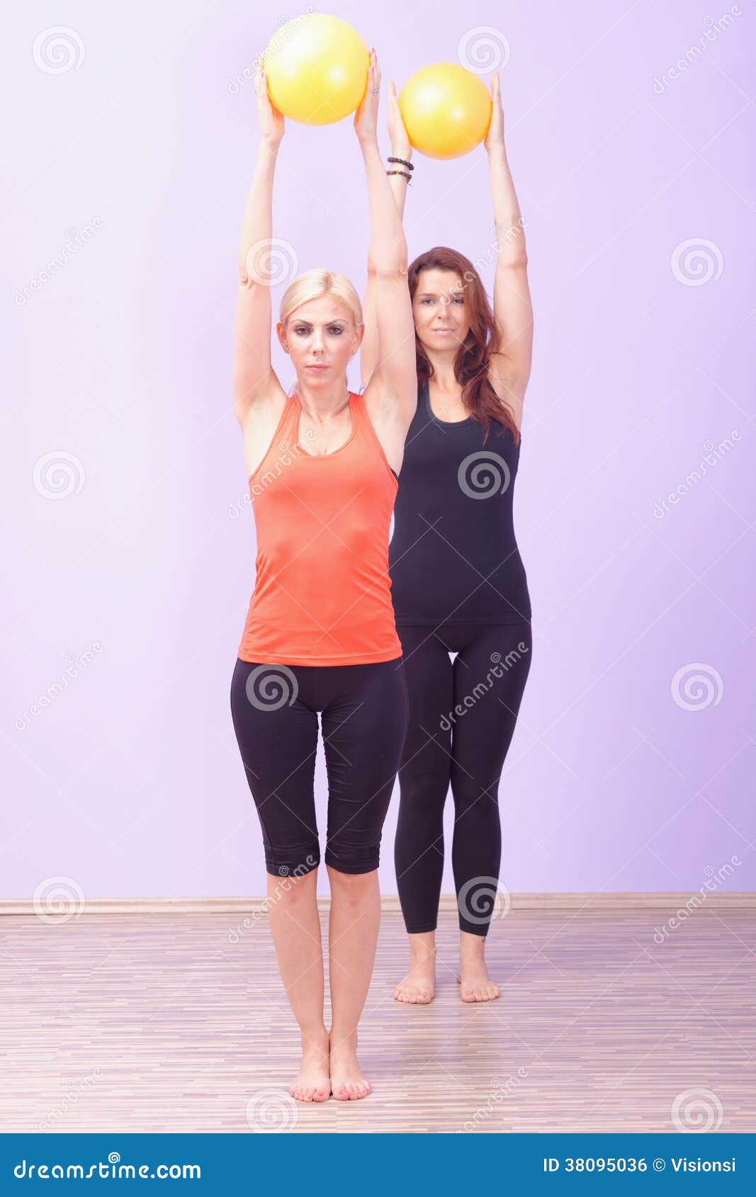 Two Women Doing Pilates Exercise Stock Photo - Image of exercise ...