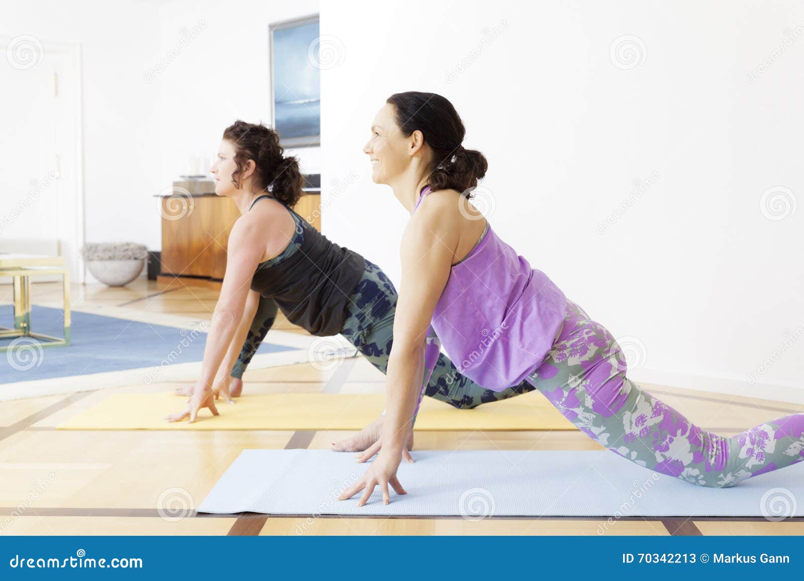 Two Women Doing Yoga at Home Stock Image - Image of living, activity ...