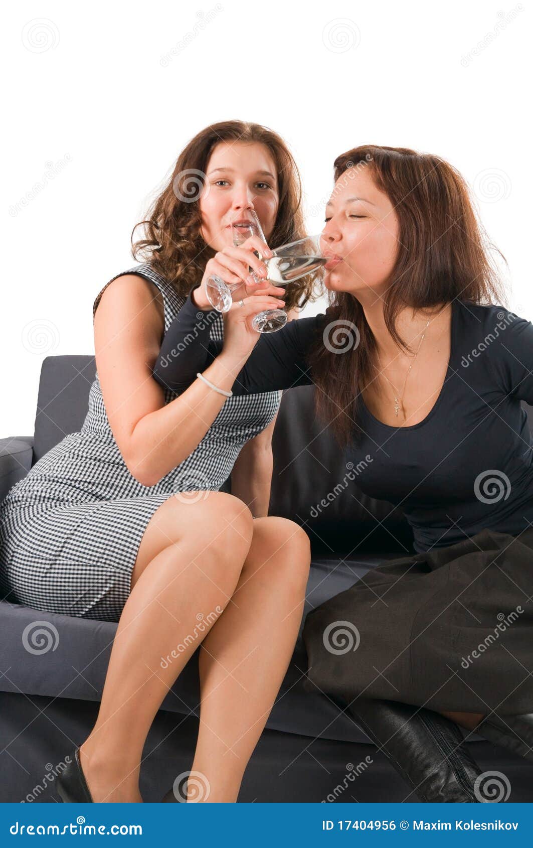 Two Women Drink Champagne Sitting on a Sofa Stock Photo - Image of ...