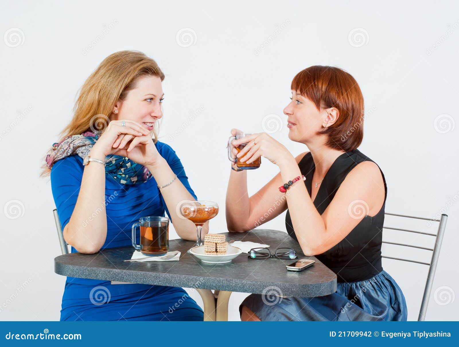 Two women drinking tea stock photo. Image of talking - 21709942