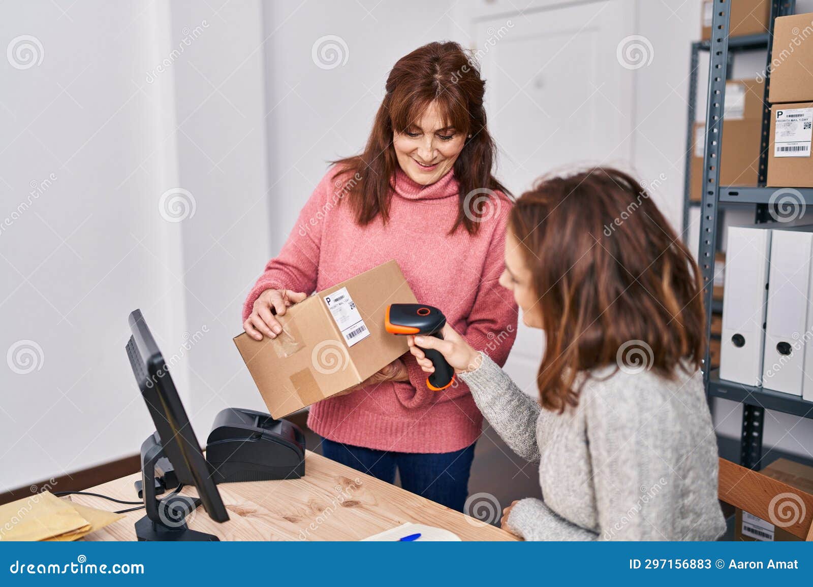 Two Women Ecommerce Business Workers Scanning Package at Office Stock ...