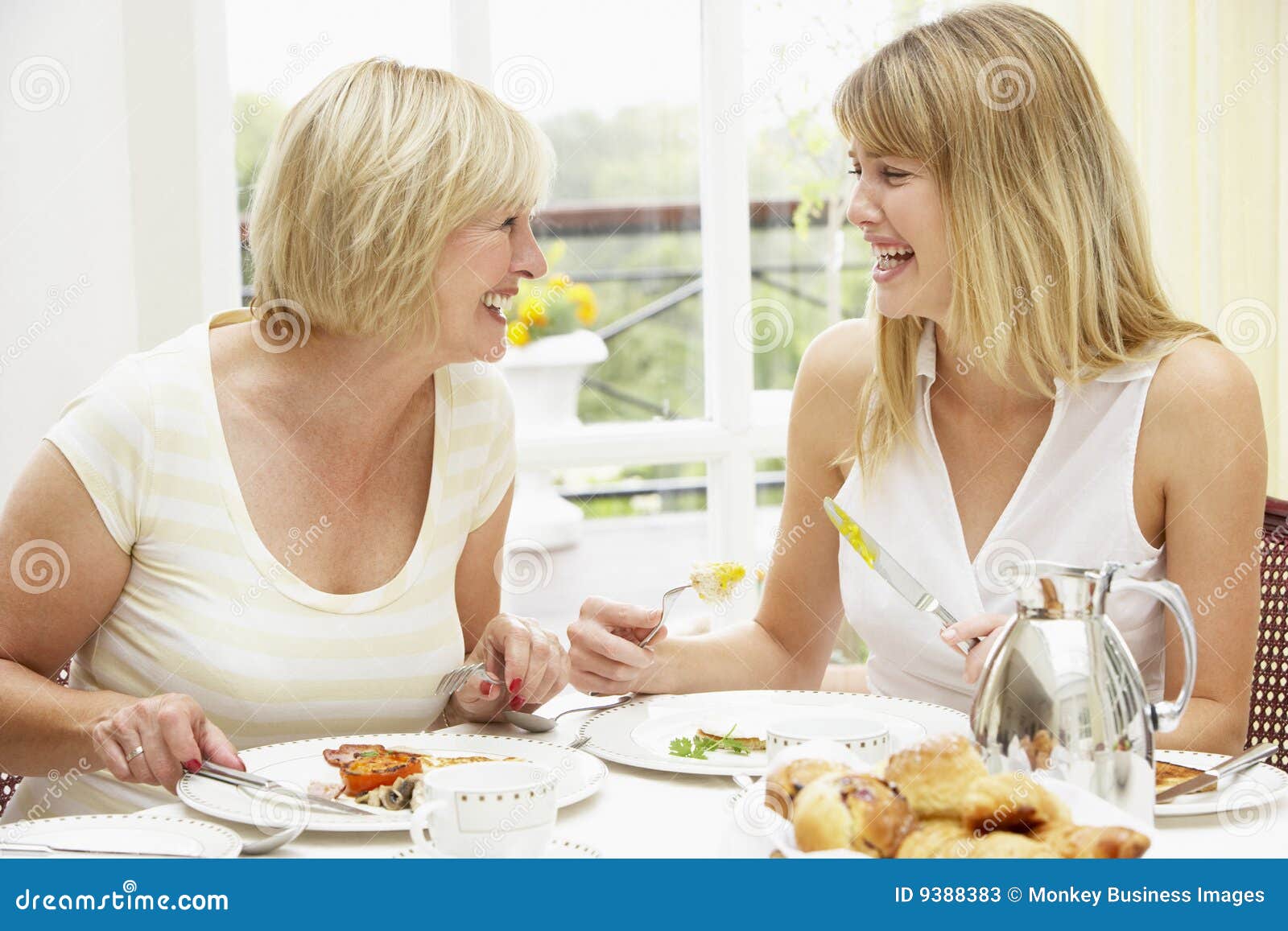 Two Women Enjoying Hotel Breakfast Stock Image - Image of happiness ...