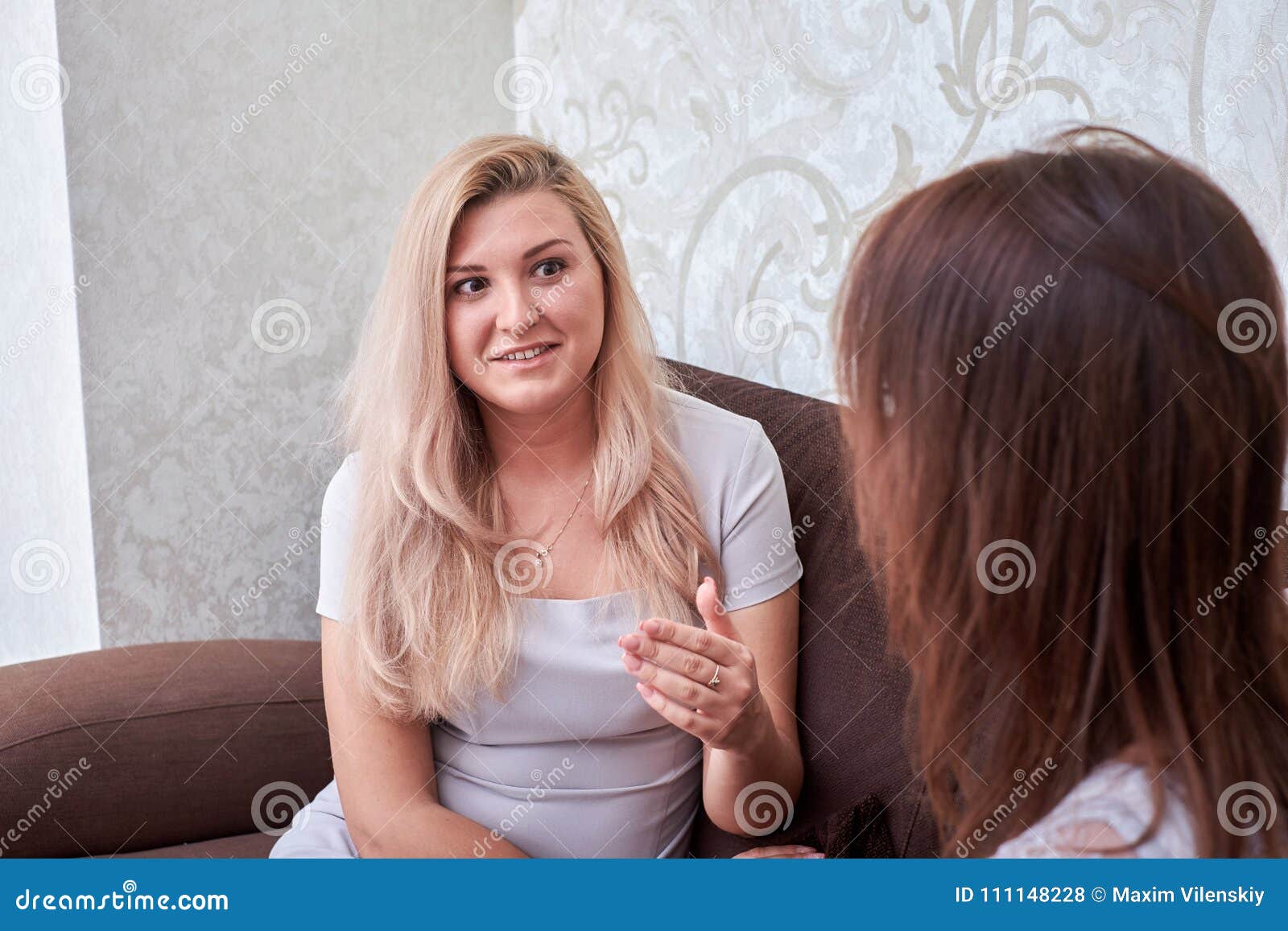 Two Women Friends Chatting on the Couch at Home Stock Photo - Image of ...