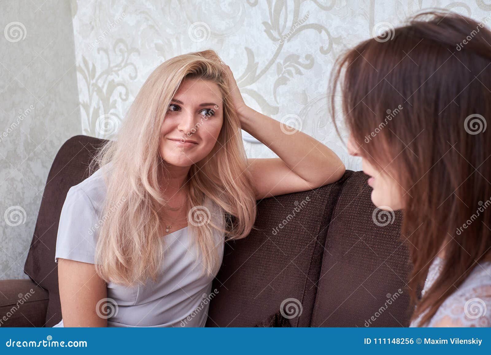 Two Women Friends Chatting on the Couch at Home Stock Photo - Image of ...