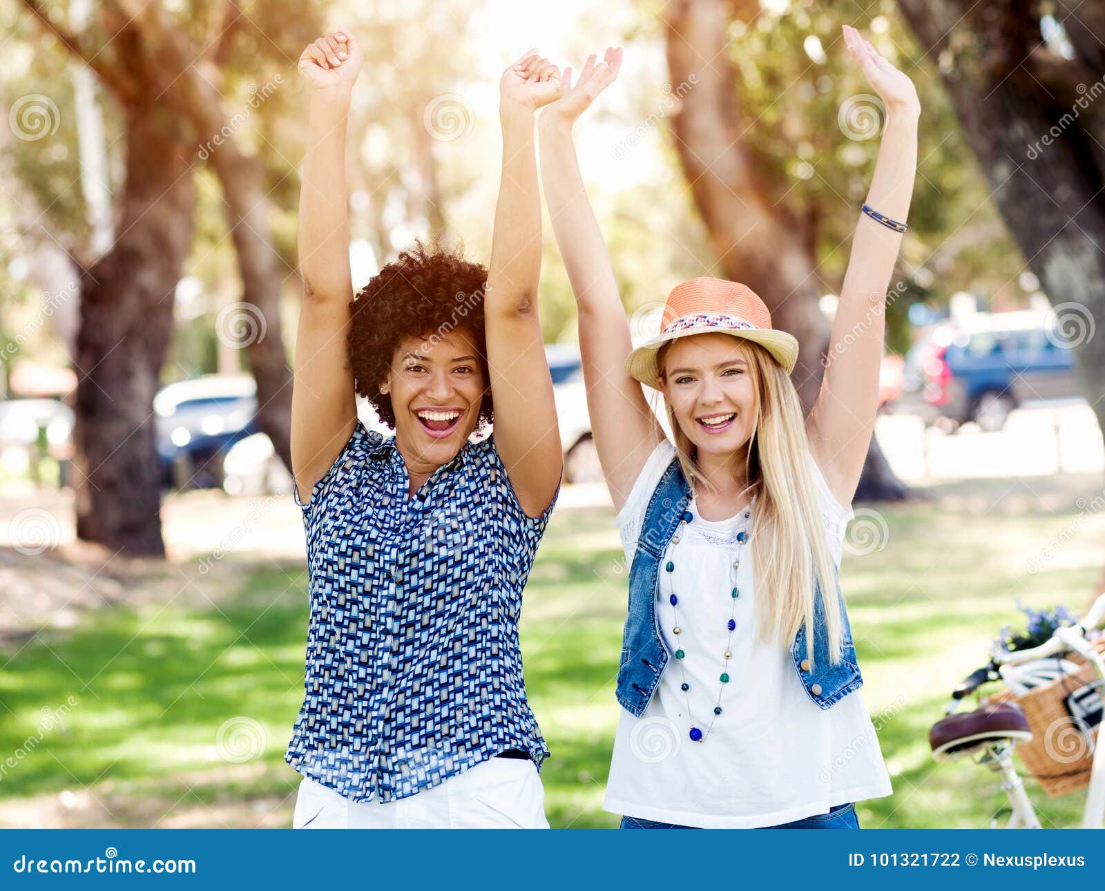Two women friends in park stock photo. Image of interestingly - 101321722