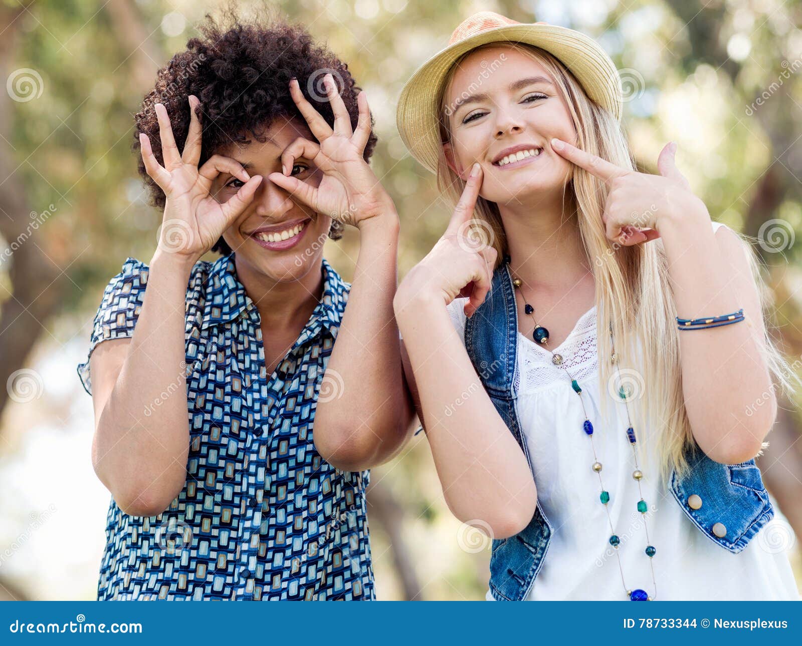 Two women friends in park stock photo. Image of hair - 78733344
