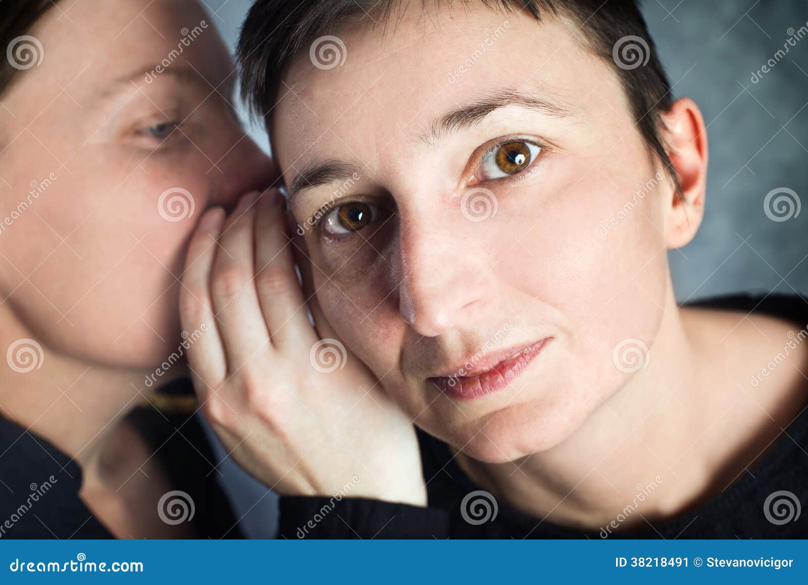 Two women gossiping stock image. Image of talking, female - 38218491