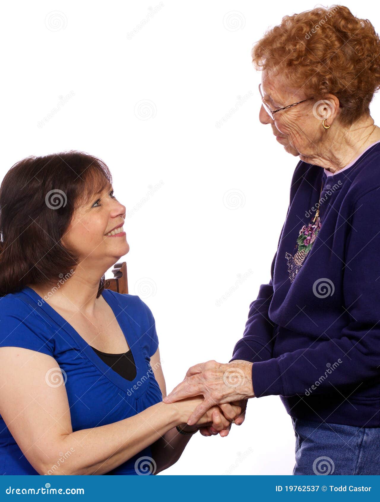 Two Women Greeting One Another Stock Image - Image of caring, isolated ...