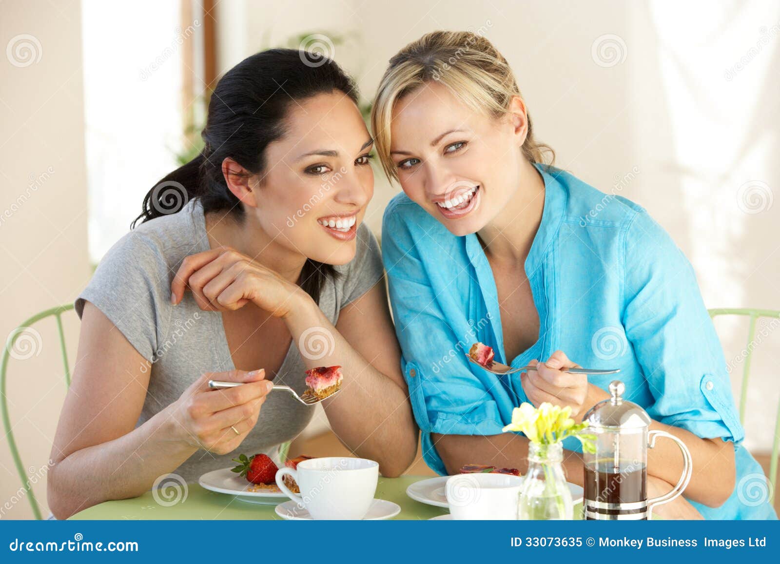 Two Women Having Snack in Cafe Stock Image - Image of food, table: 33073635