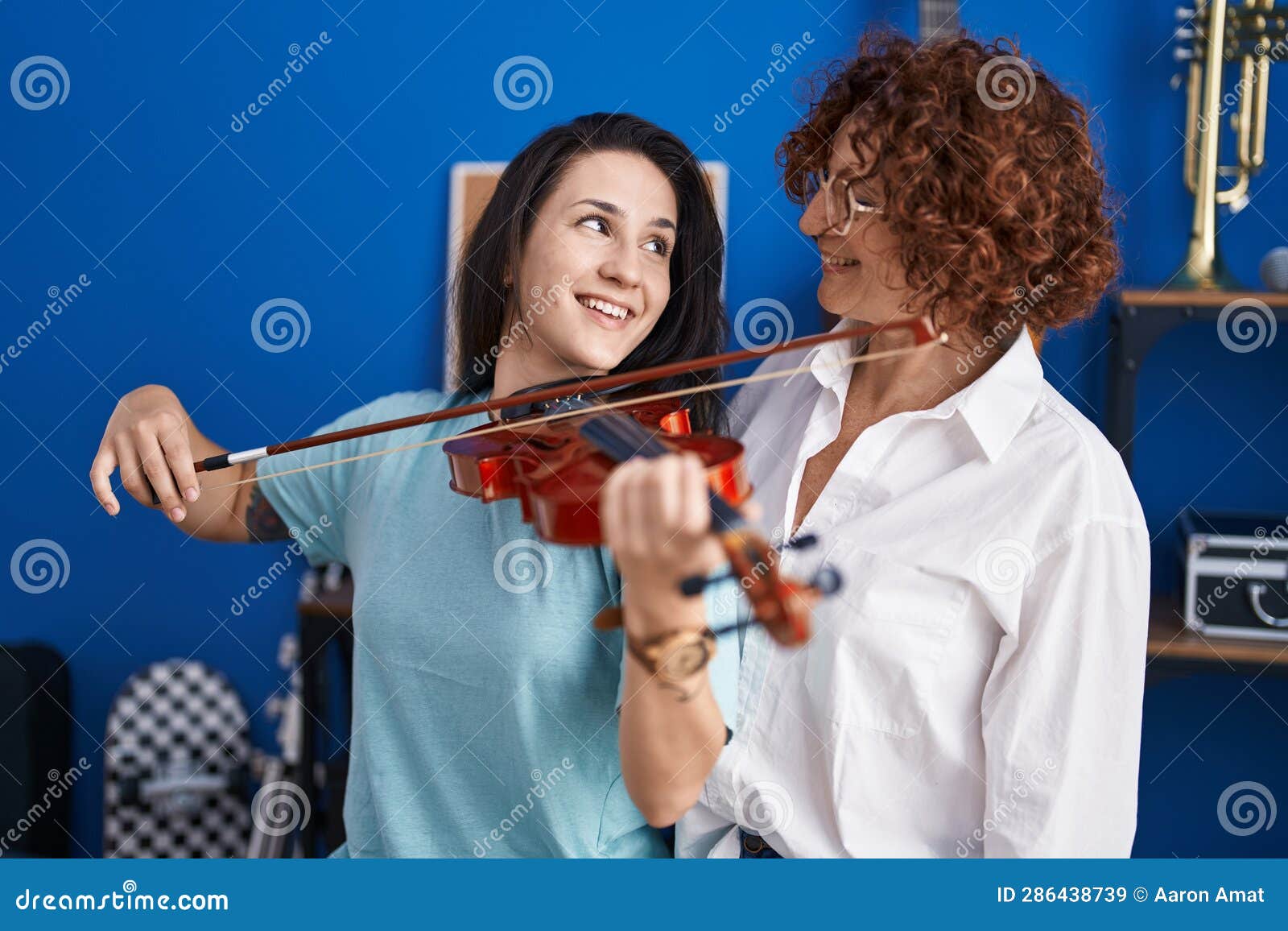 Two Women Having Violin Lesson at Music Studio Stock Image - Image of ...