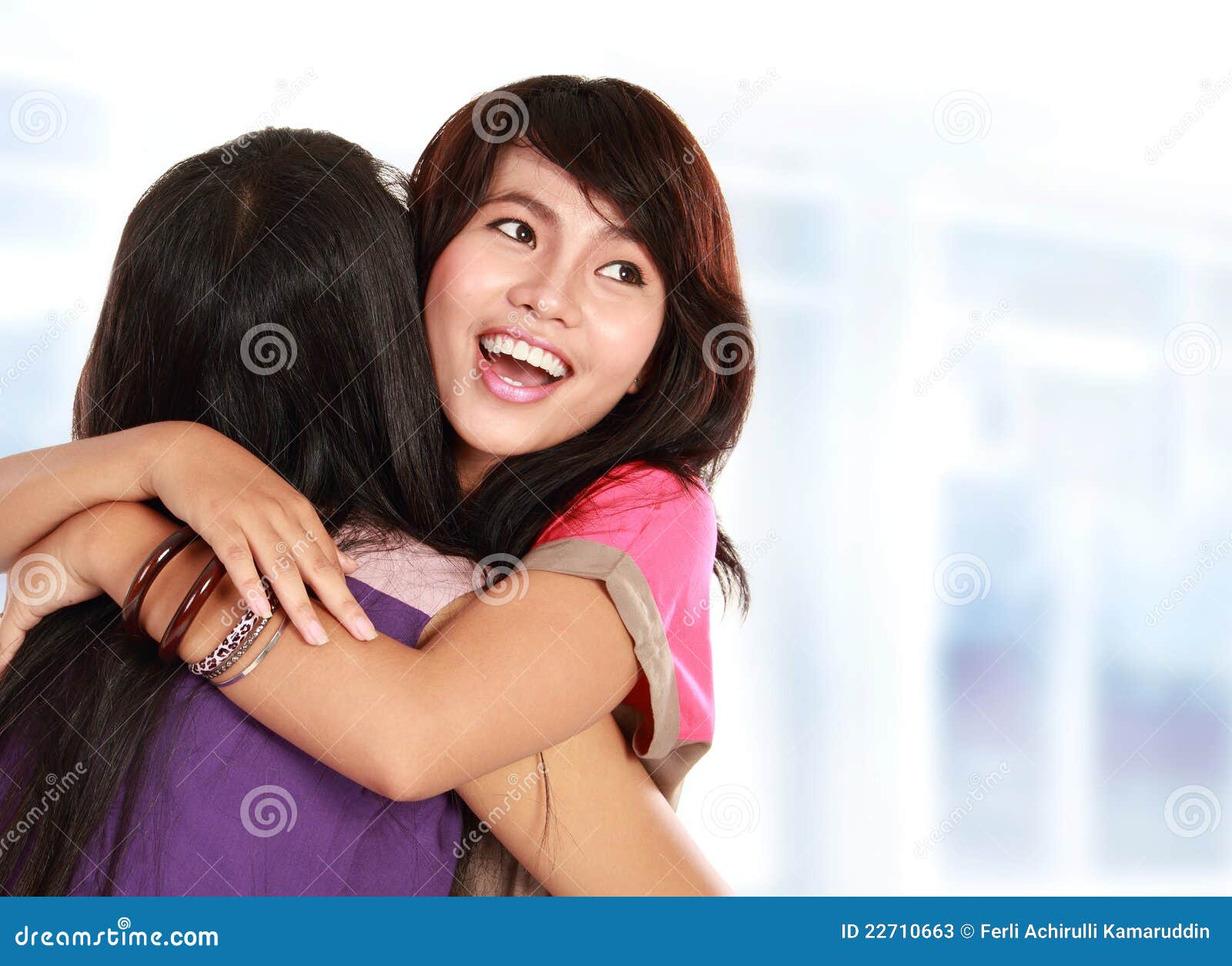 Two Women Hugging Stock Photos - Image: 22710663