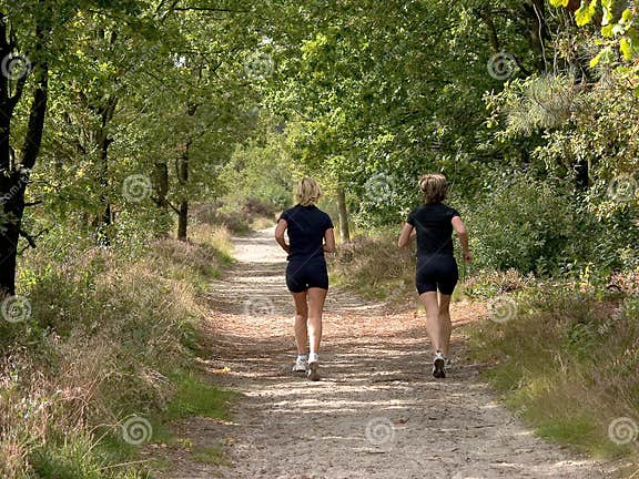 Two women Jogging. stock image. Image of leisure, outfit - 262087