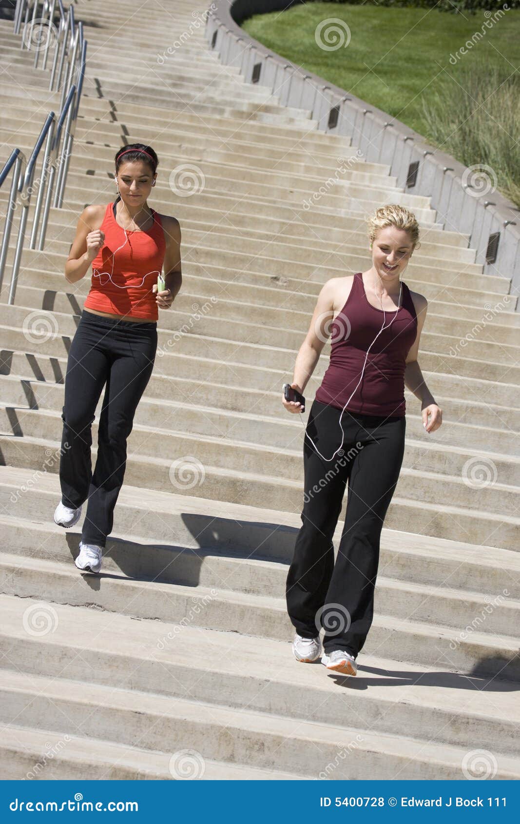 Two Women Jogging Down Steps Stock Photo - Image of goals, adults: 5400728