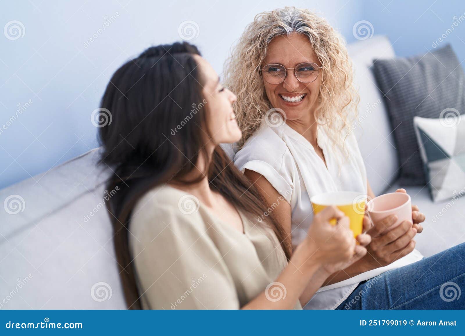 Two Women Mother And Daughter Drinking Coffee At Home Stock Image