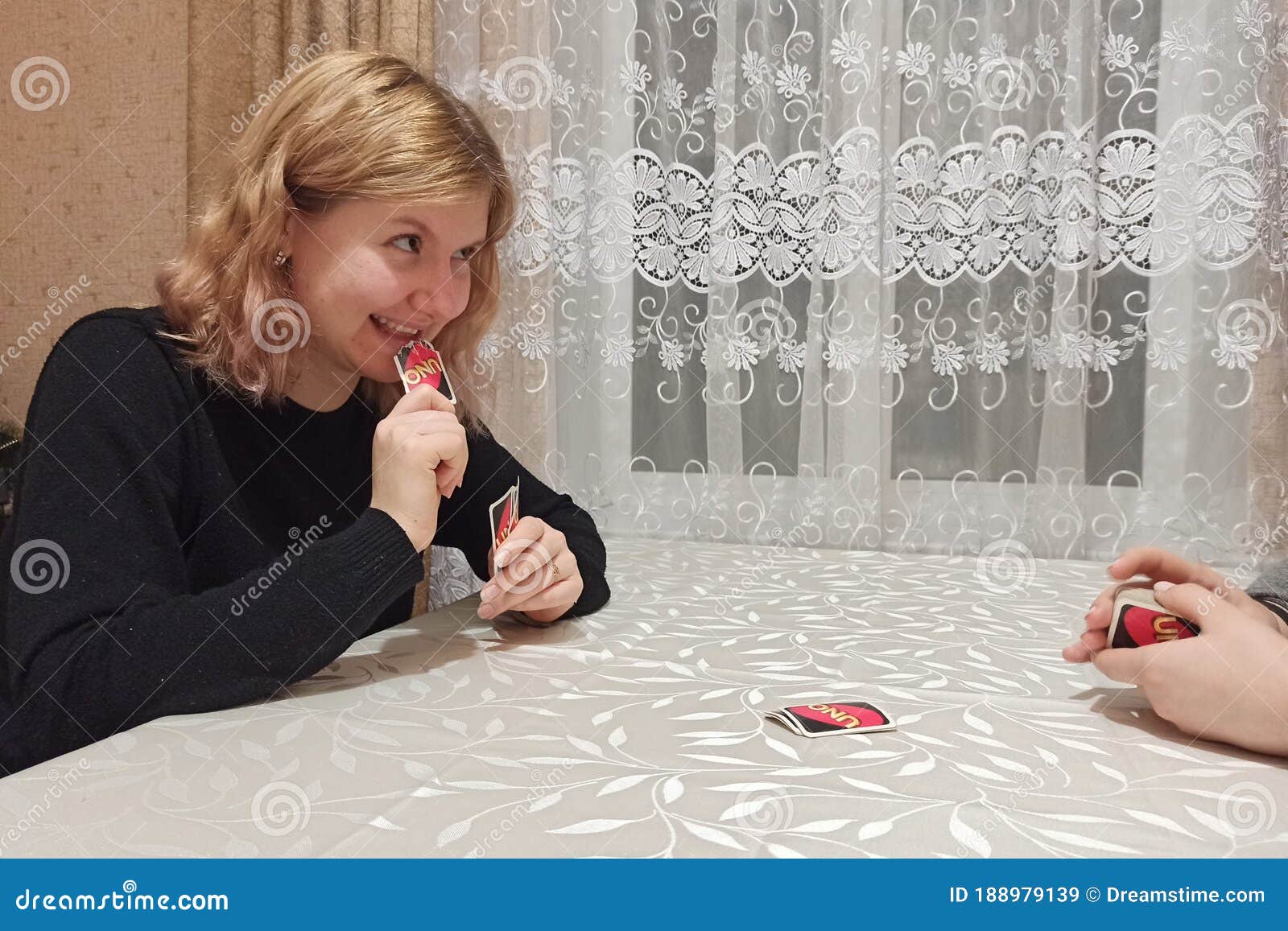 Women Play Uno Cards at Table Editorial Stock Image - Image of ...