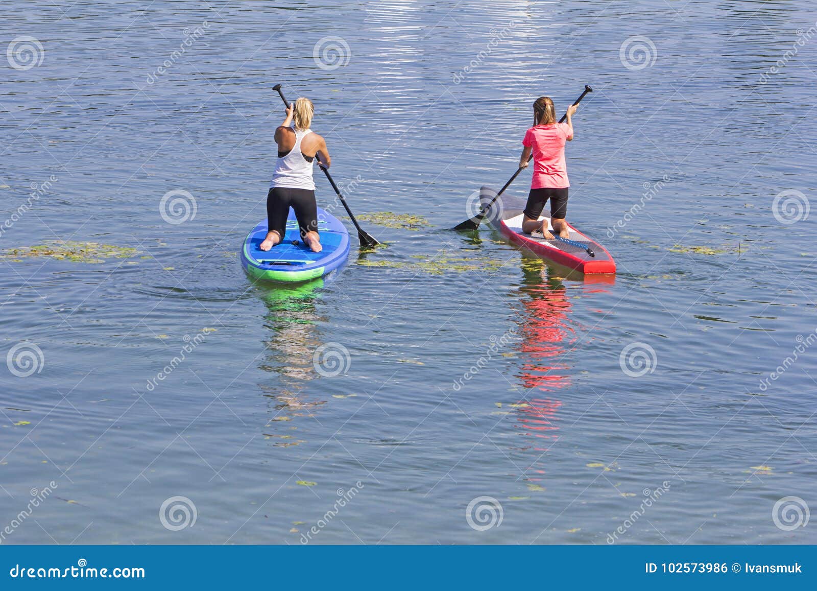 Two Women Practicing Paddle Board Editorial Photo - Image of female ...