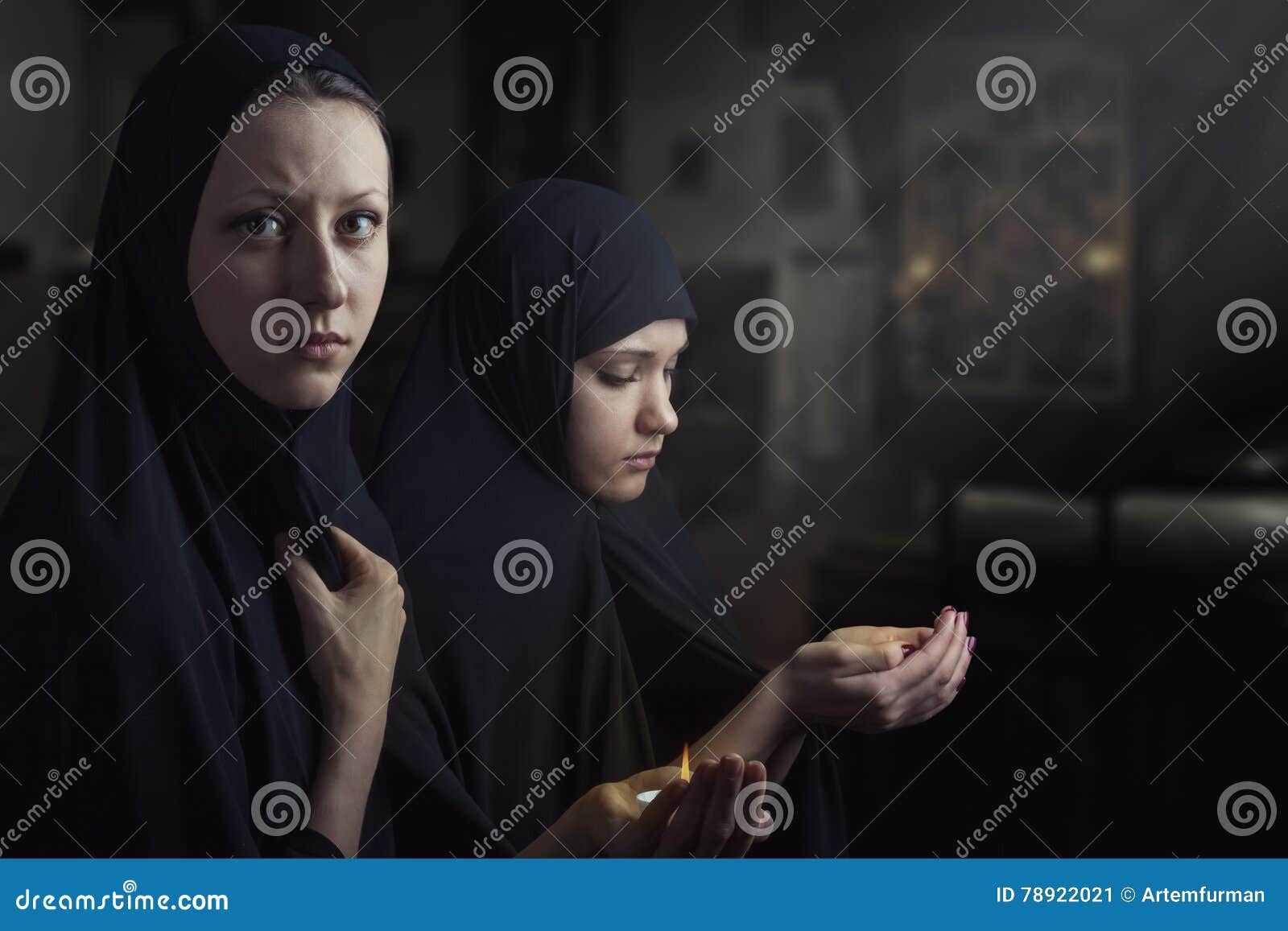 Two women pray stock image. Image of human, light, grace - 78922021
