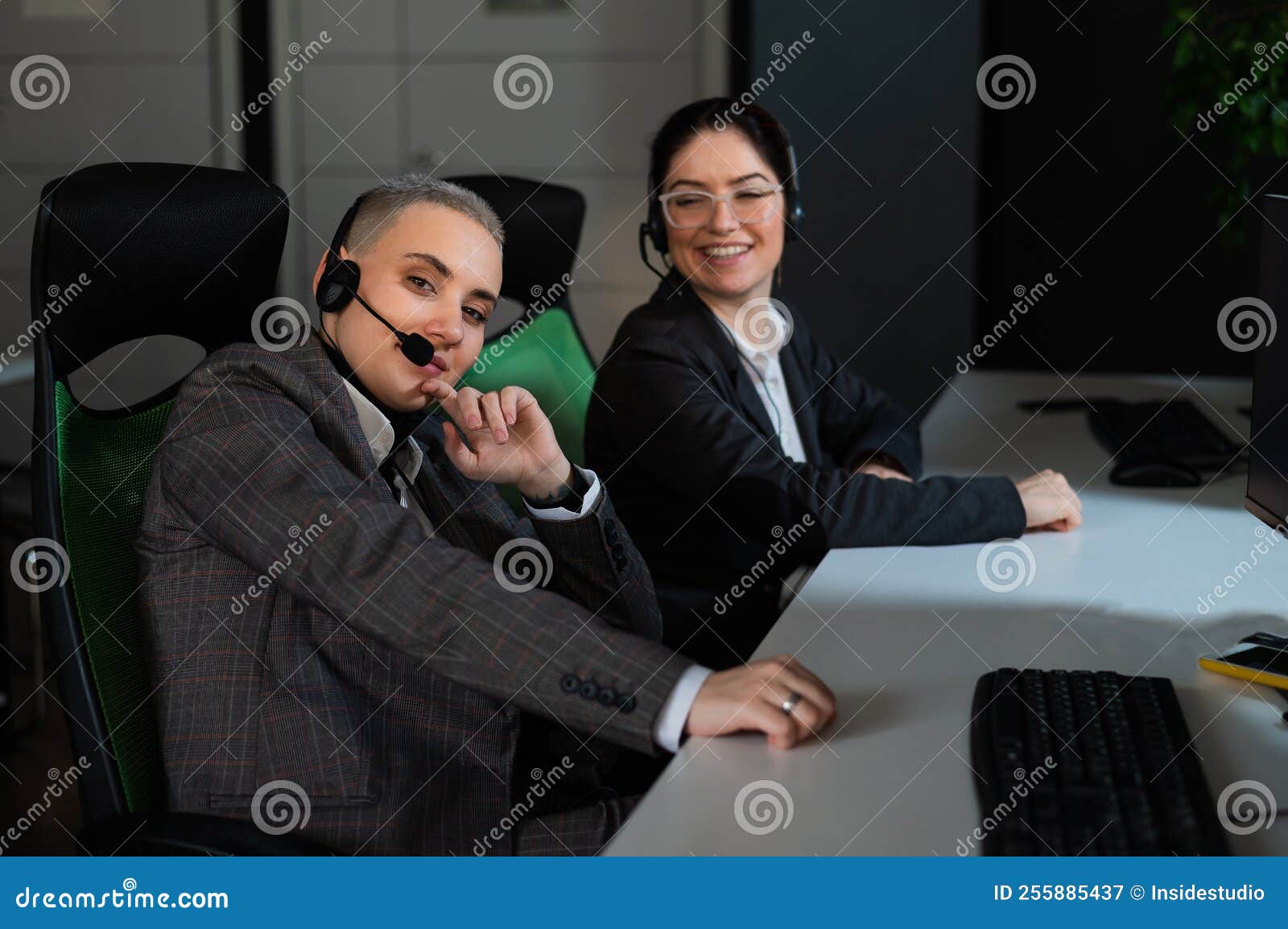 Two Women in Protective Masks are Bored at Work. Call Center Operators ...