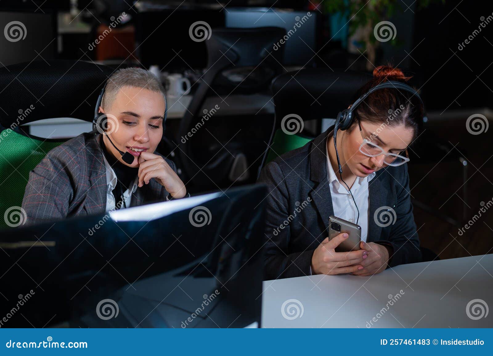 Two Women in Protective Masks are Bored at Work. Call Center Operators ...