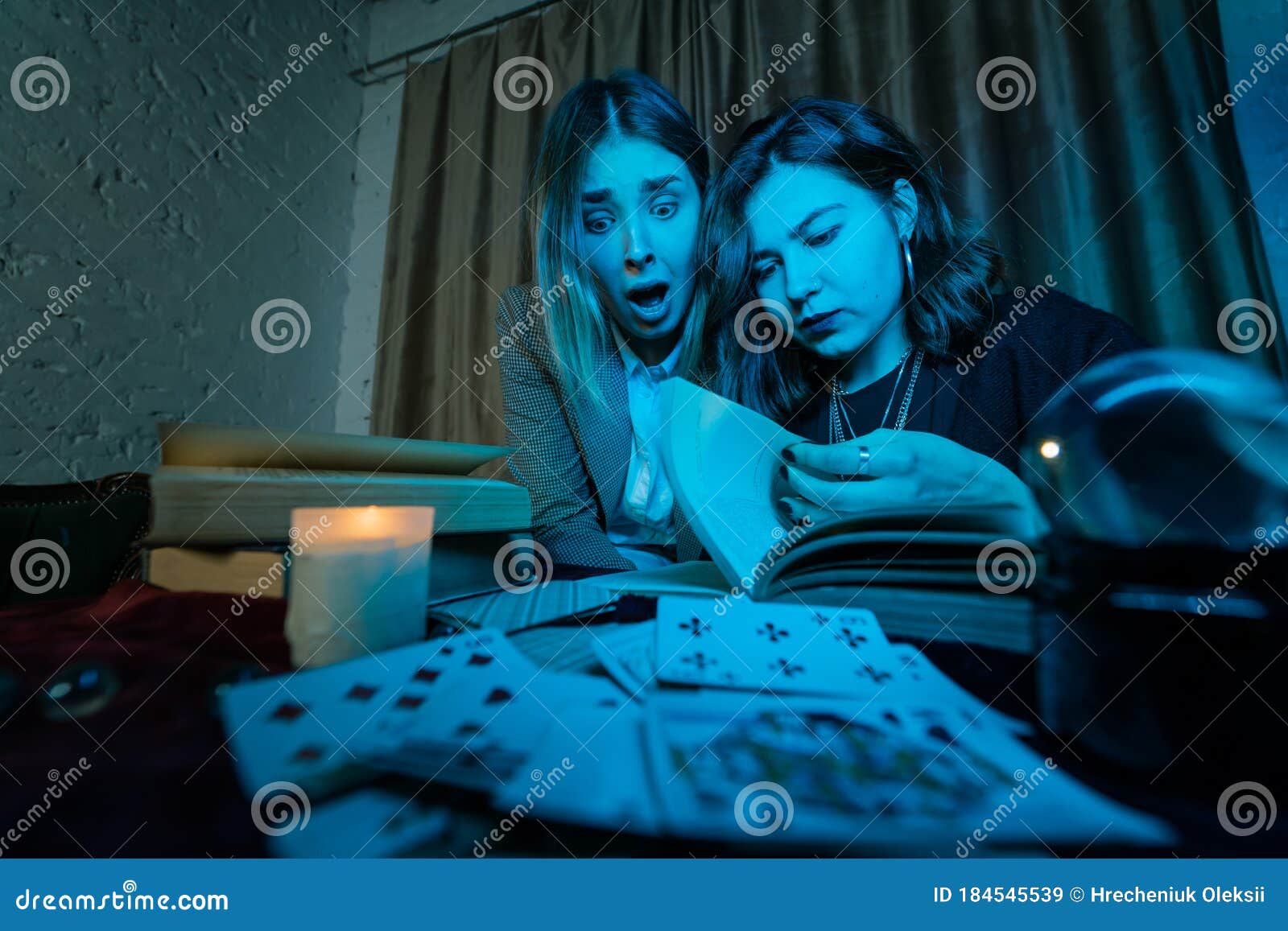 Two Women are Reading a Mysterious Book Stock Image - Image of magical ...