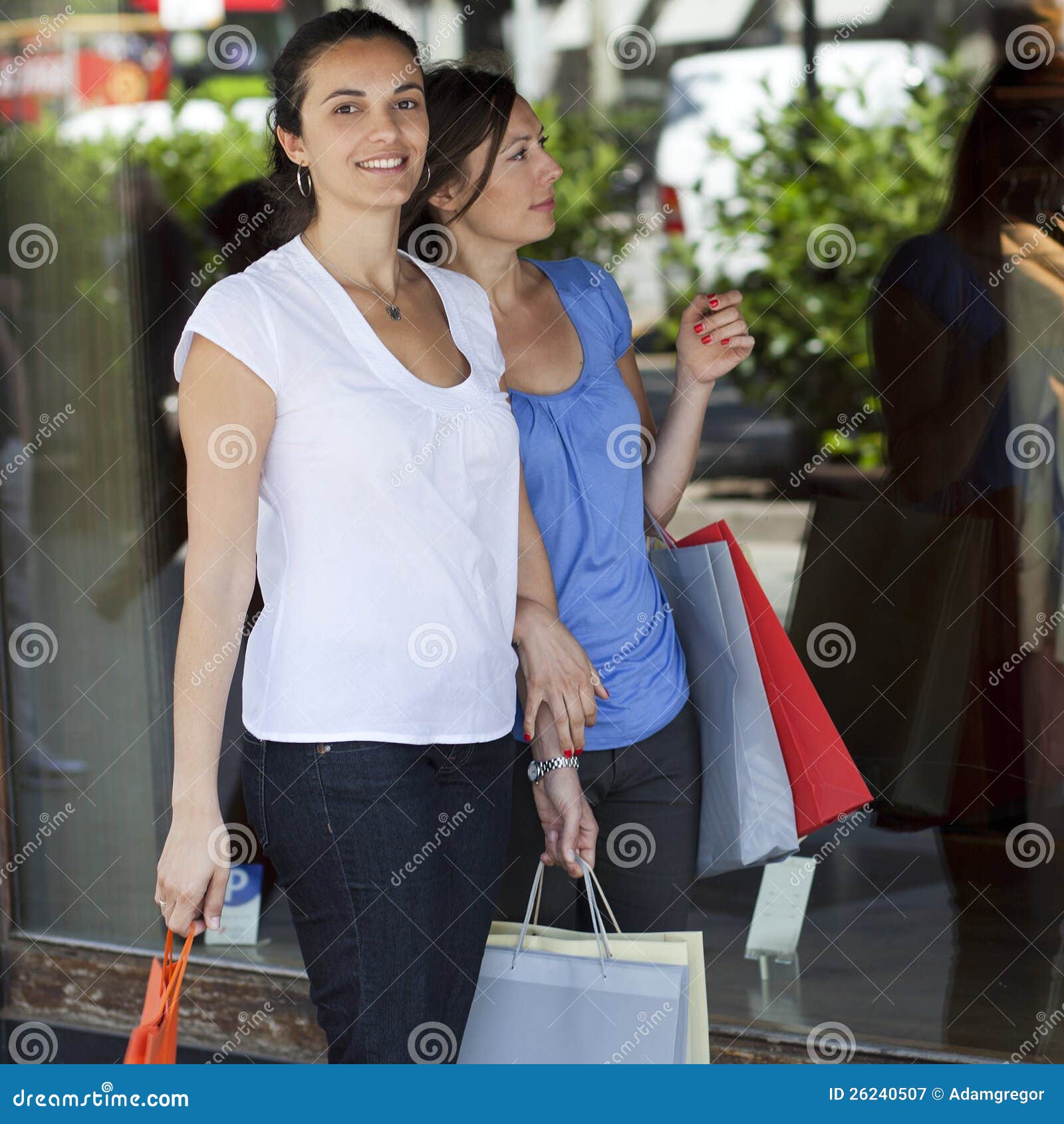 Two women shopping stock image. Image of lady, welldressed - 26240507