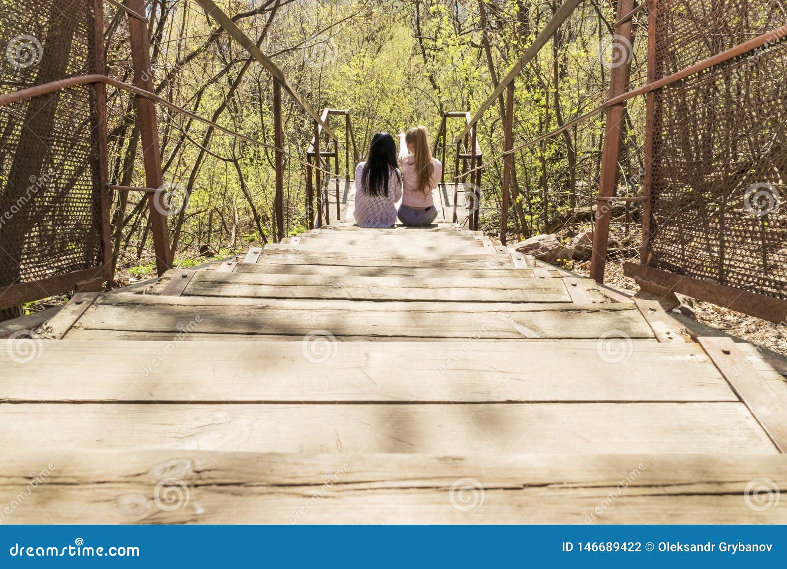 Two Women are Sitting on the Steps Stock Photo - Image of attractive ...