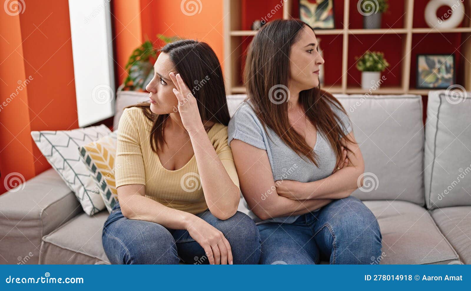 Two Women Sitting on Sofa Arguing at Home Stock Photo - Image of ...