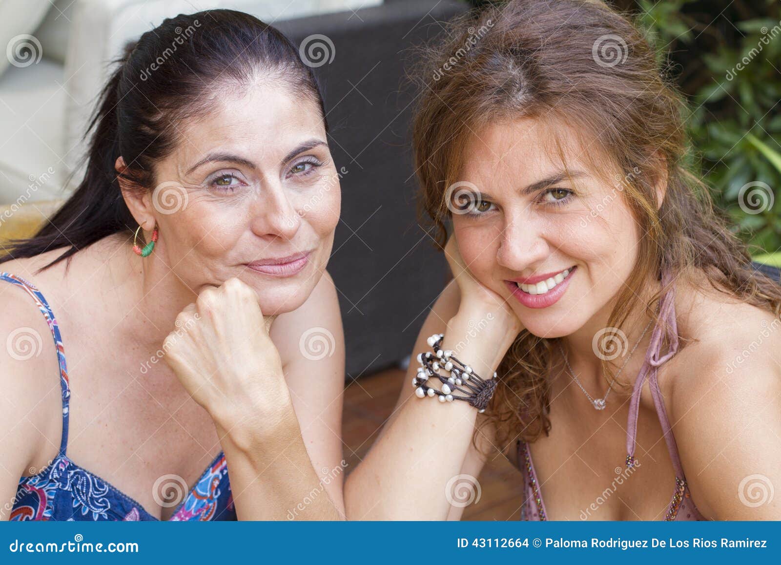 Two Women Smiling at the Camera Stock Photo - Image of caucasian ...