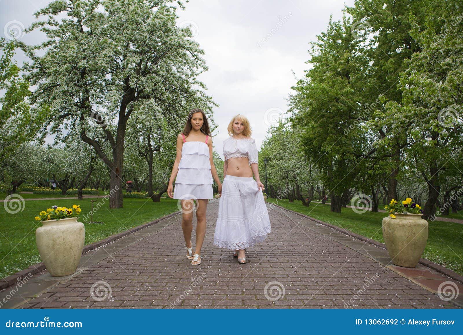 Two women at spring stock photo. Image of outdoor, sunny - 13062692