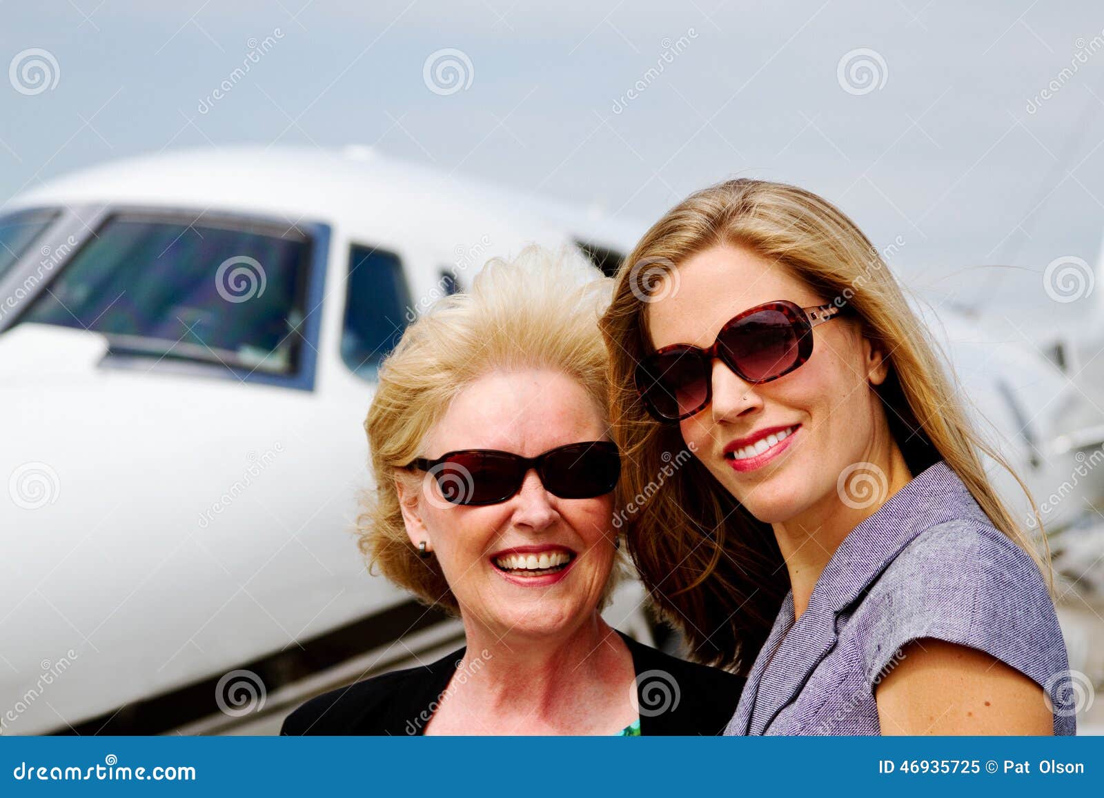 Two Women Standing Outside Jet Stock Image - Image of luxury, person ...