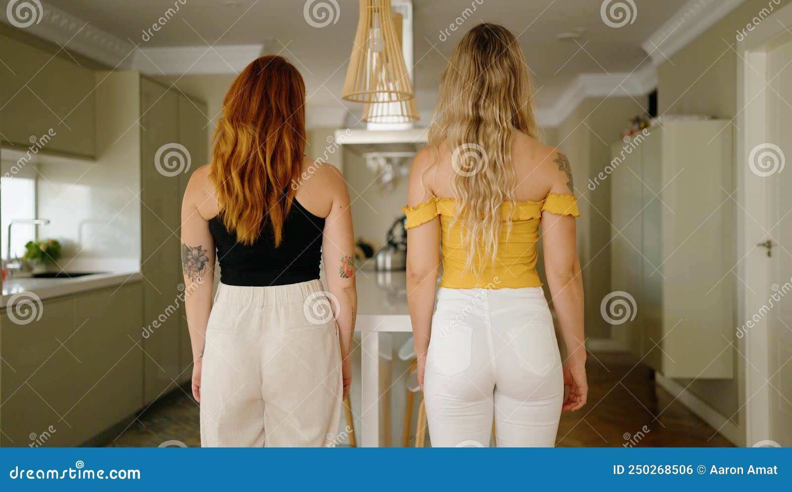 Two Women Standing Together on Back View at Home Stock Photo - Image of ...