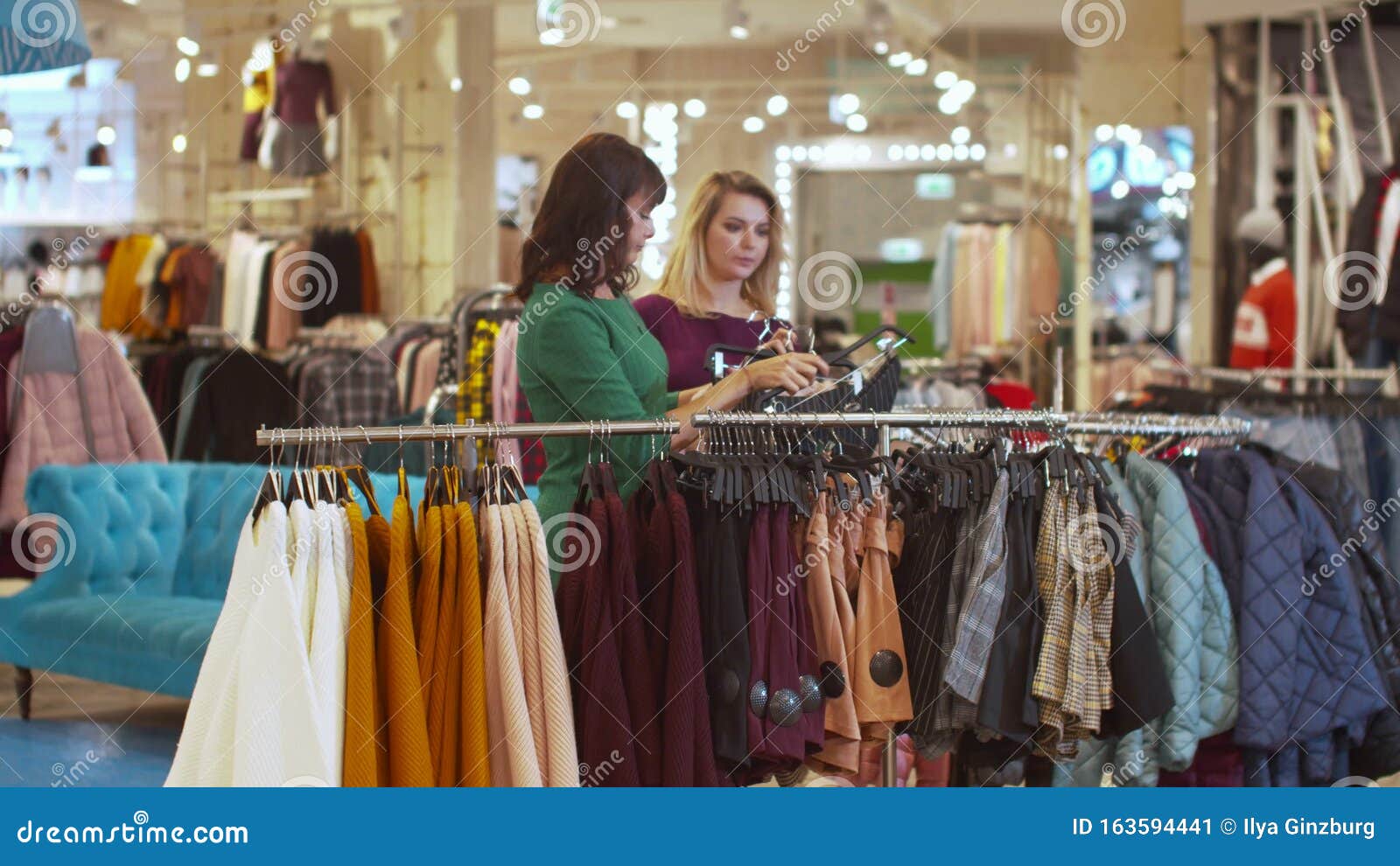 Two Girls Take Off Their Clothes From The Hanger Stock Video Video Of Human Personal 163594441