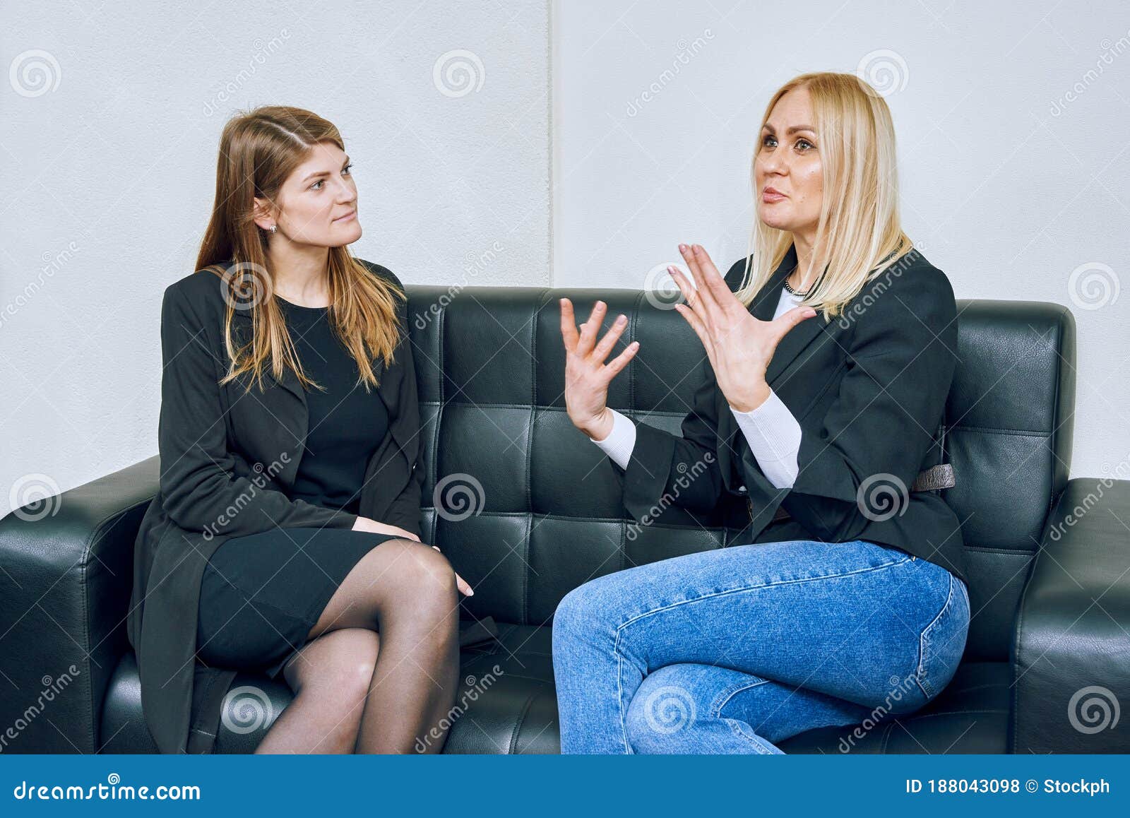 Two Women are Talking on the Sofa Stock Photo - Image of friend ...