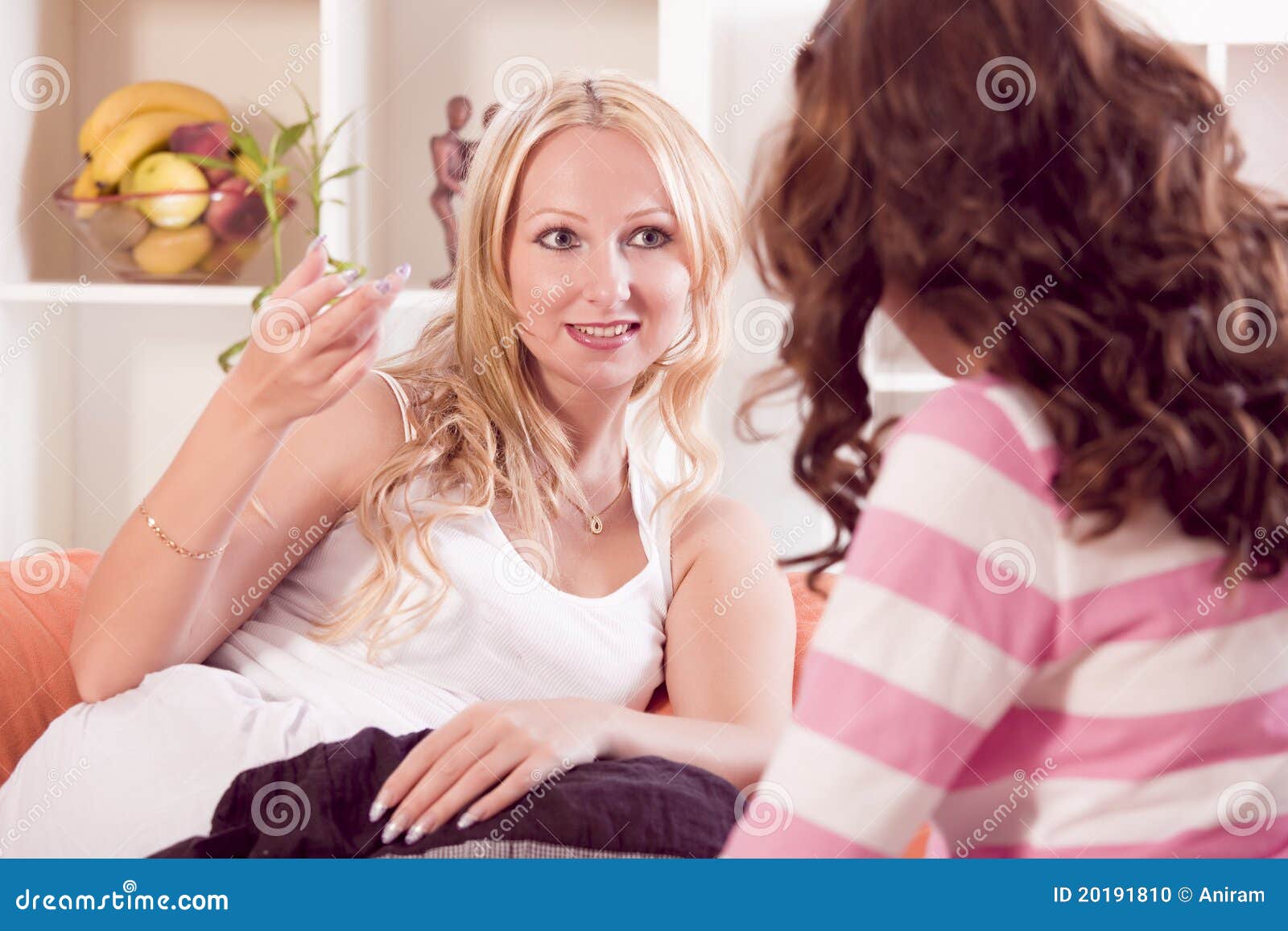 Two women talking together stock photo. Image of happy - 20191810