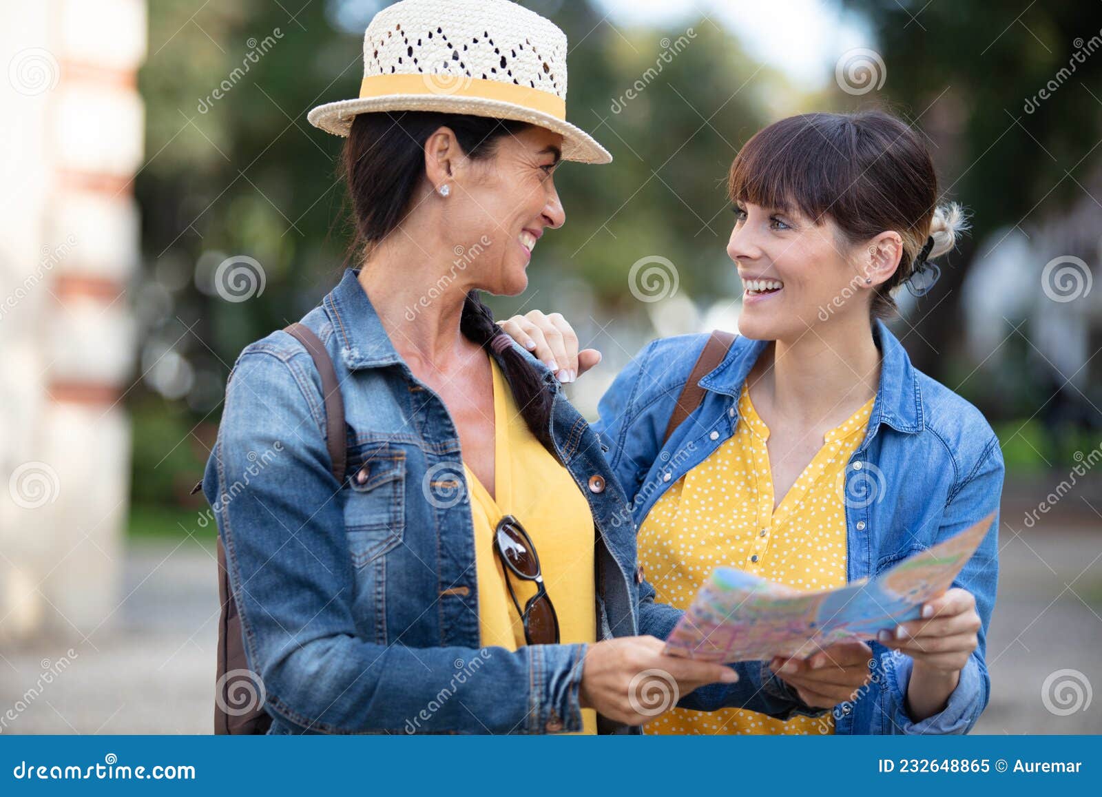 Two Women Tourists Using Map in City Stock Image - Image of tourists ...