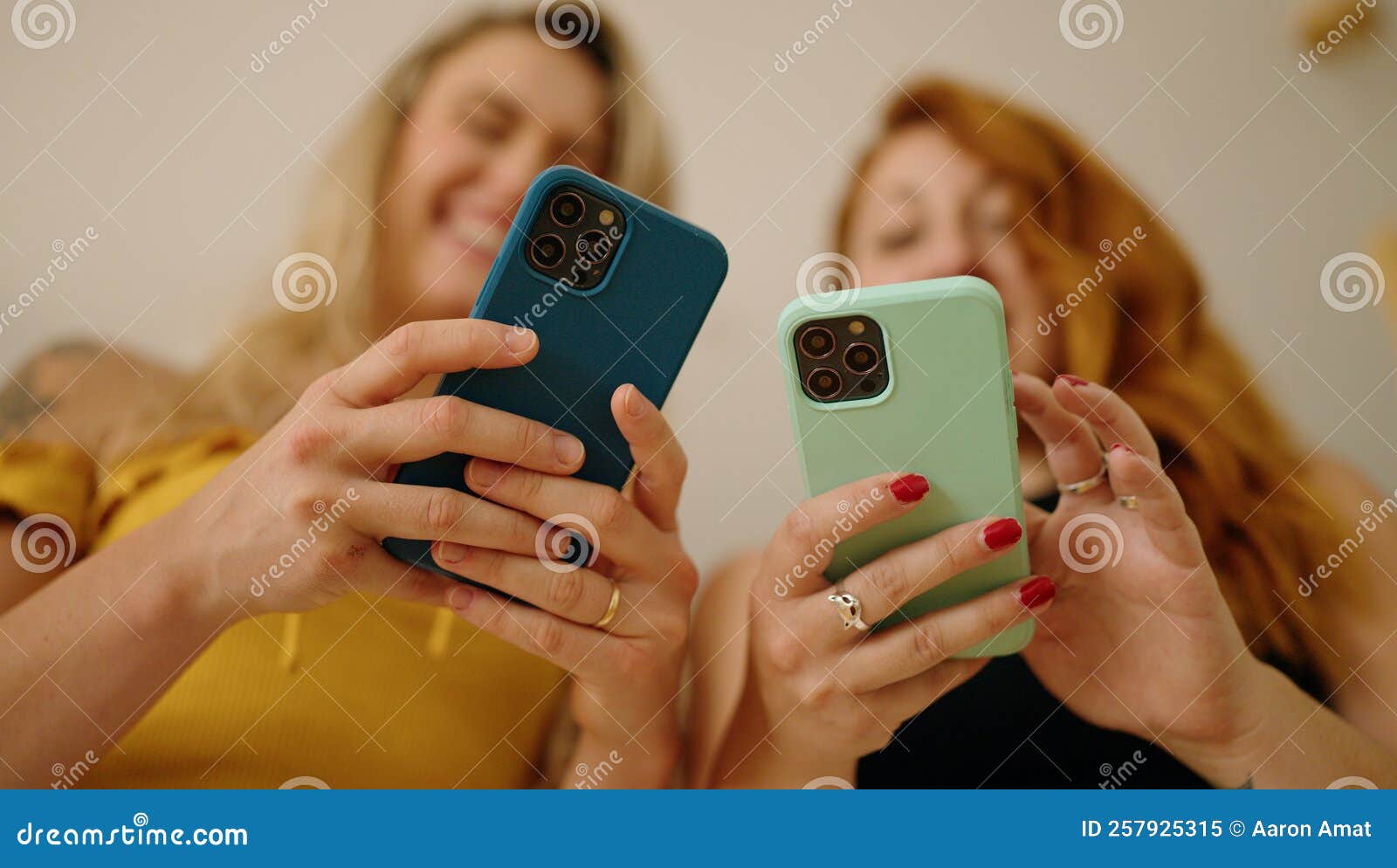 Two Women Using Smartphones Standing at Home Stock Image - Image of ...