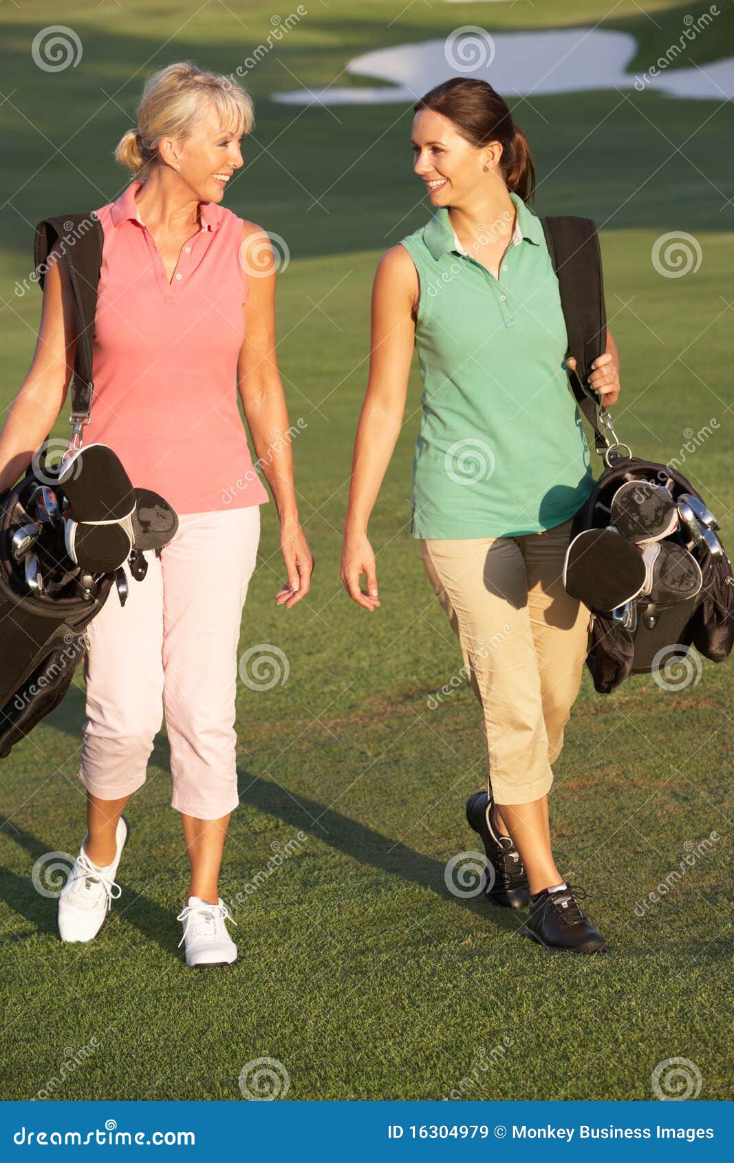 Two Women Walking Along Golf Course Stock Image - Image of sixties ...